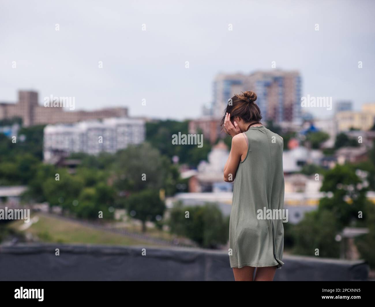 Roof depression woman loneliness concept Stock Photo - Alamy