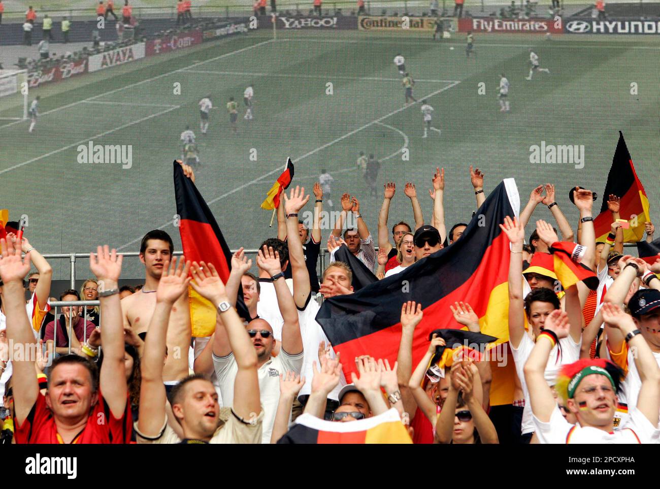 German soccer fans cheer during the World Cup soccer match Germany ...