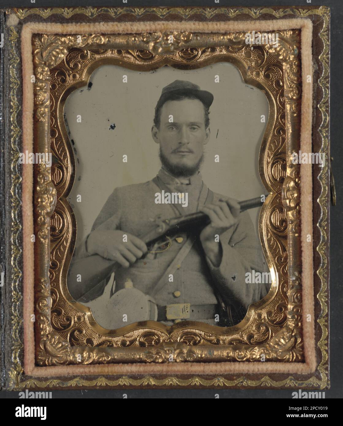 Unidentified soldier in Confederate uniform with percussion shotgun and ...
