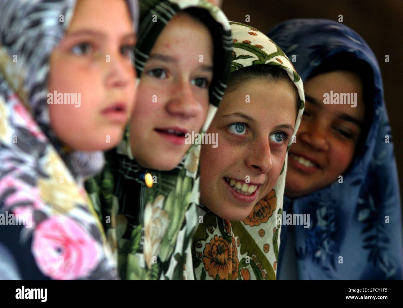 Bulgarian Muslim girls attend the traditional prayer for rain near the ...