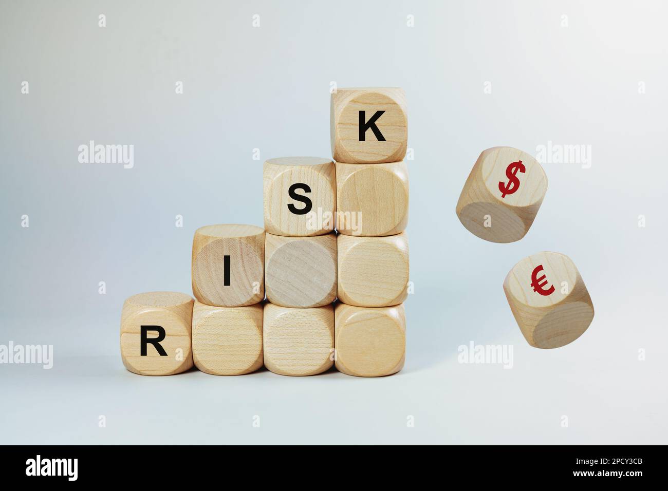 Financial concept for speculation with currencies, stacked wooden cubes ...