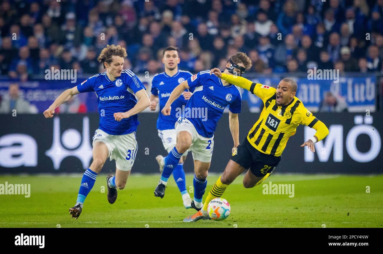 Gelsenkirchen, Germany. 11th Mar, 2023. Alex Kral (S04), Cedric Brunner ...