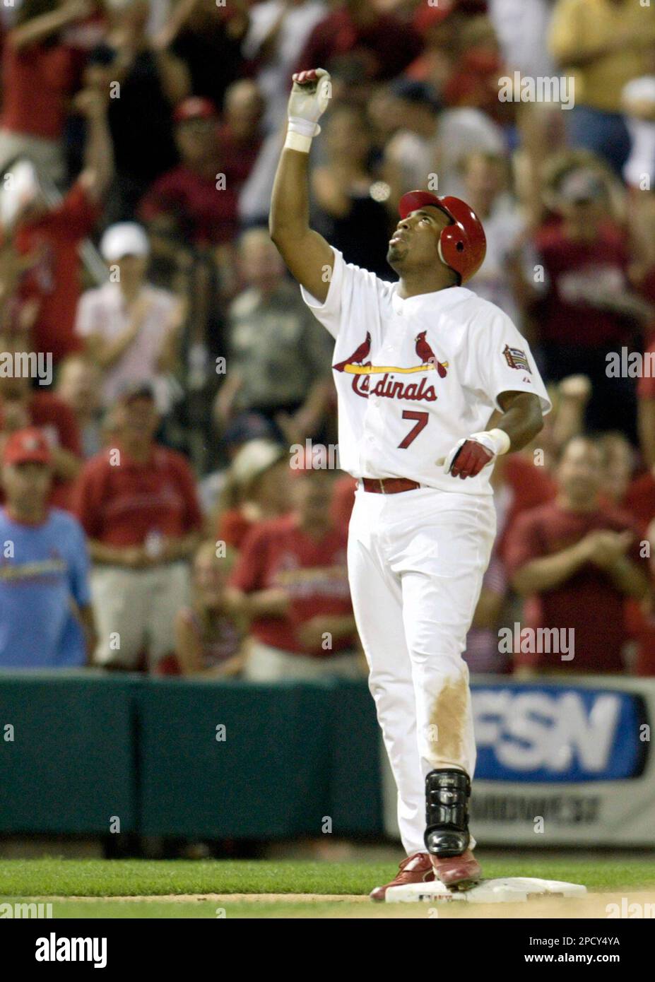 St. Louis Cardinals Hector Luna points skyward after hitting a bases ...