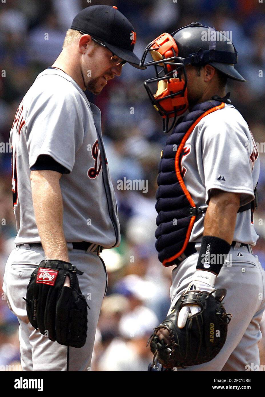 Detroit Tigers pitcher Nate Robertson, left, talks to catcher Ivan ...
