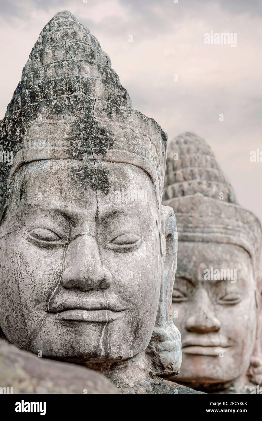 Large stone sculptures at the famous Angkor Thom Temple Stock Photo - Alamy