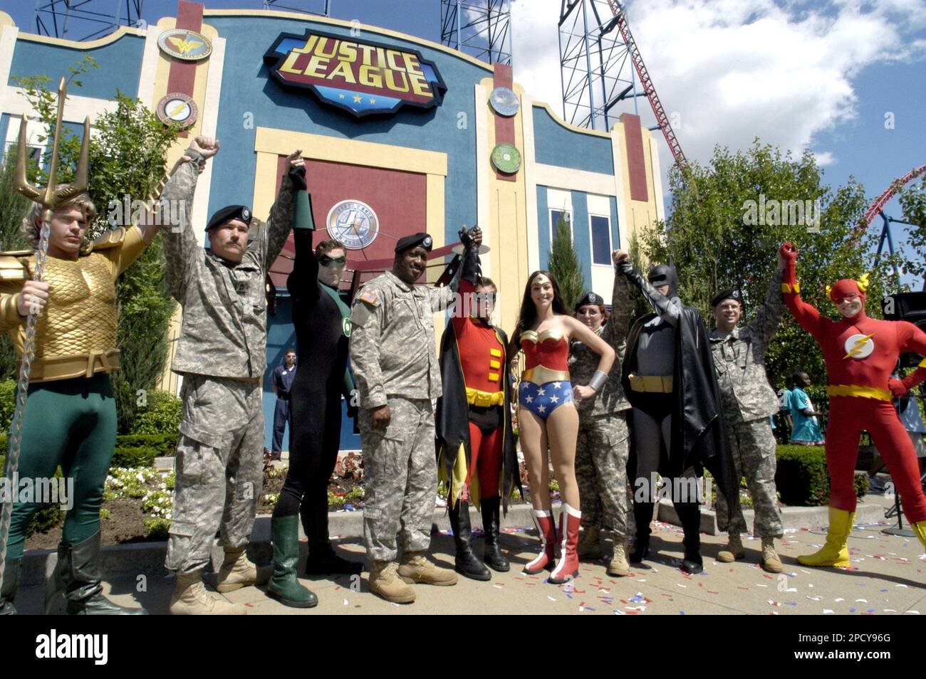 National Guard recruiters and soldiers stand with heroes from the world ...