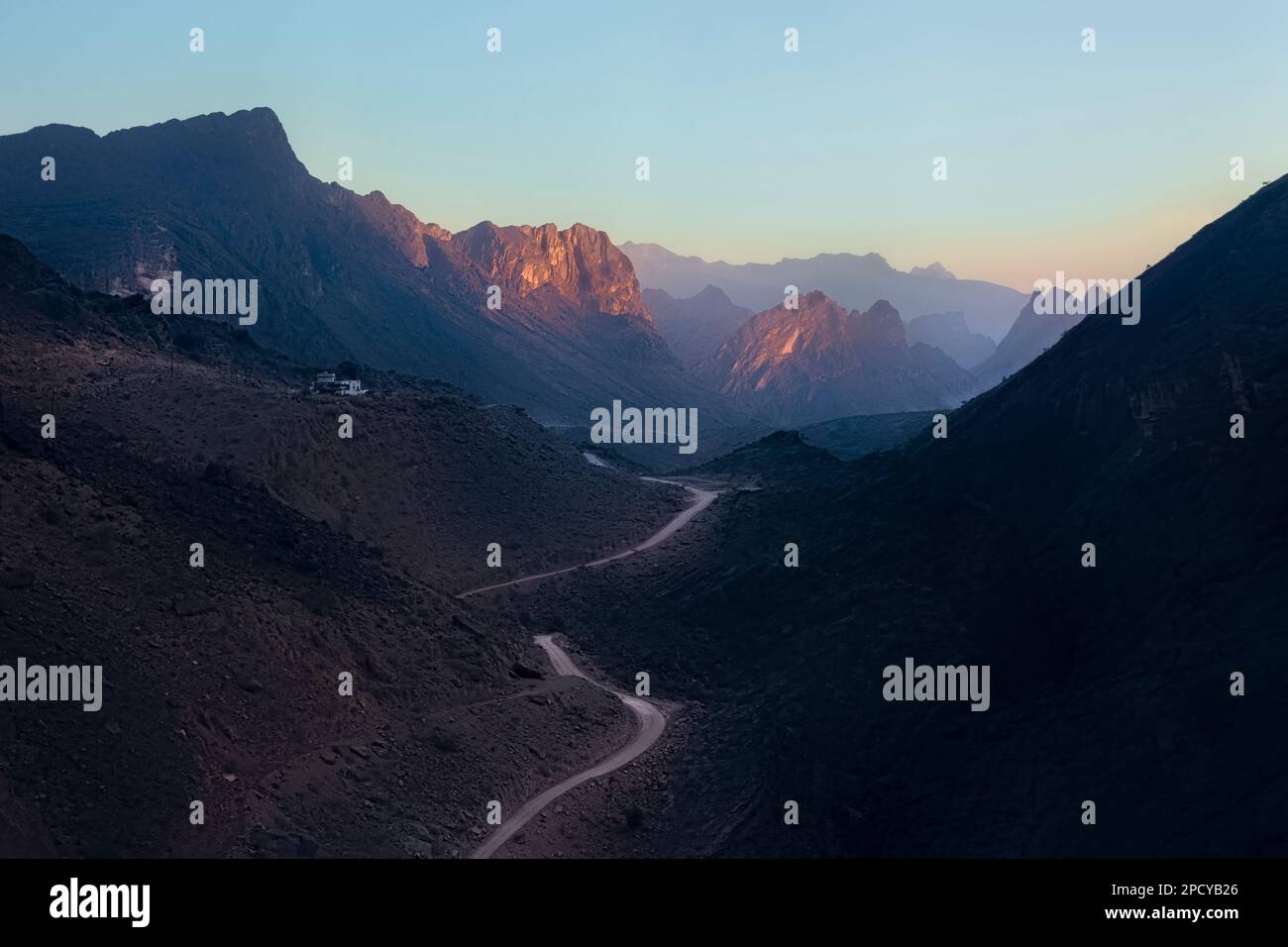 The wild road through Snake Canyon and Wadi Ban Auf at sunrise, Western ...