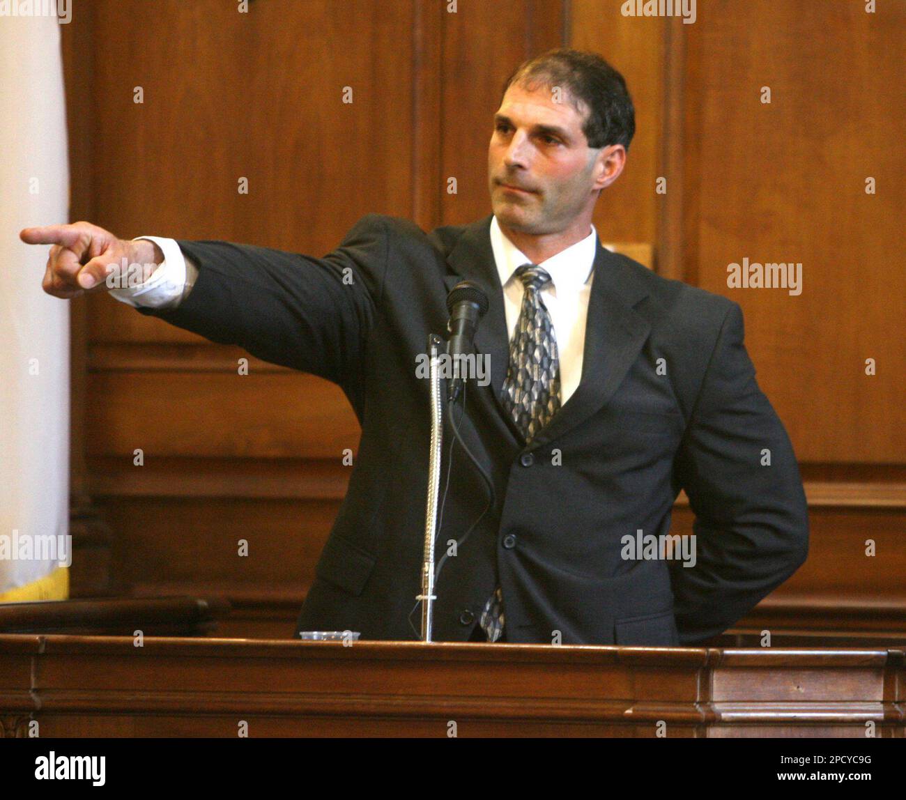 Christopher Zarrella points to Esteban Carpio to identify him during ...