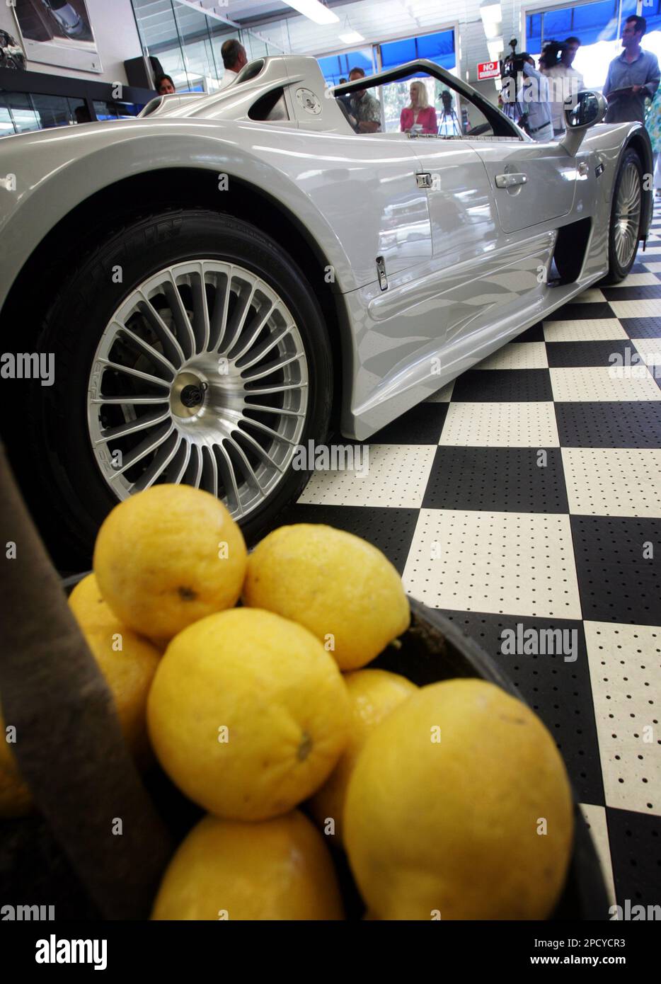 Fresh lemons are seen in front of a Mercedes-Benz AMG CLK-GTR roadster ...