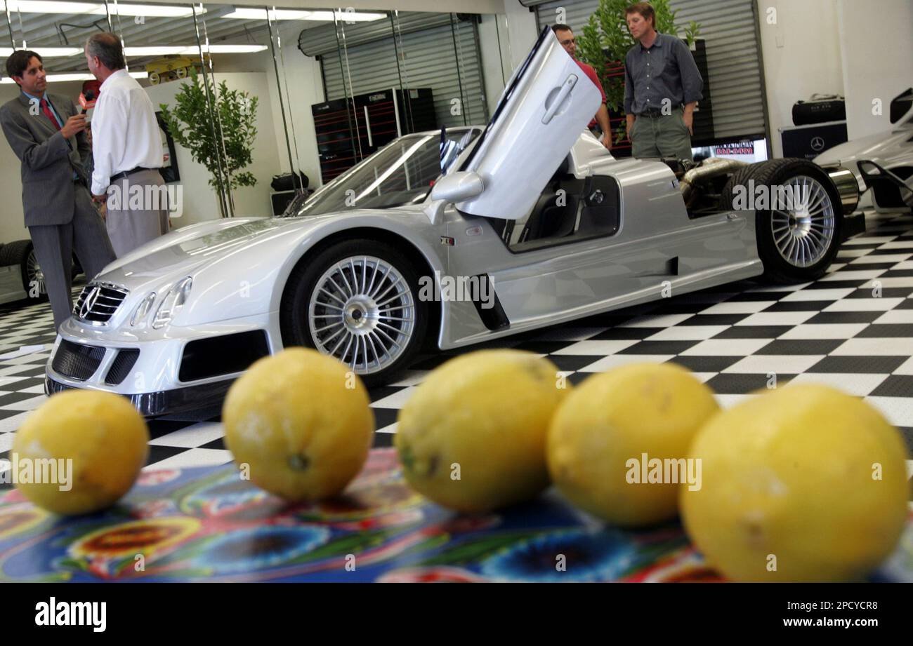 Fresh lemons are seen in front of a Mercedes-Benz AMG CLK-GTR roadster ...
