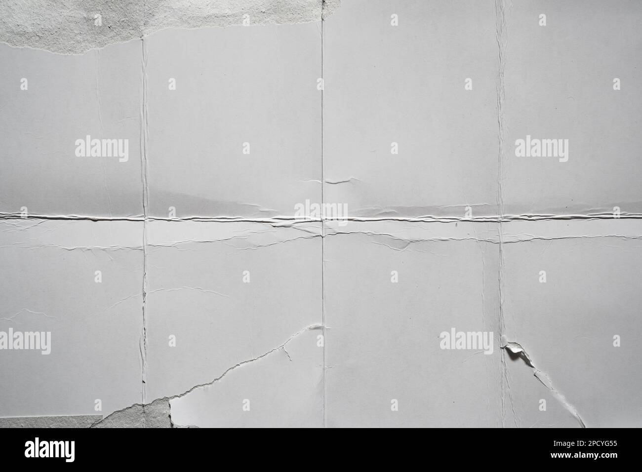 White damaged paper background folded into eight parts Stock Photo - Alamy