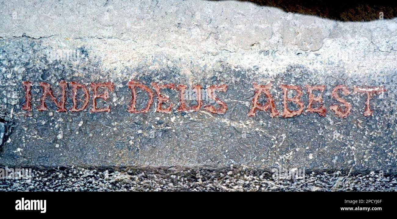 The Latin inscription "Inde deus abest" or " Where God does not exist ...