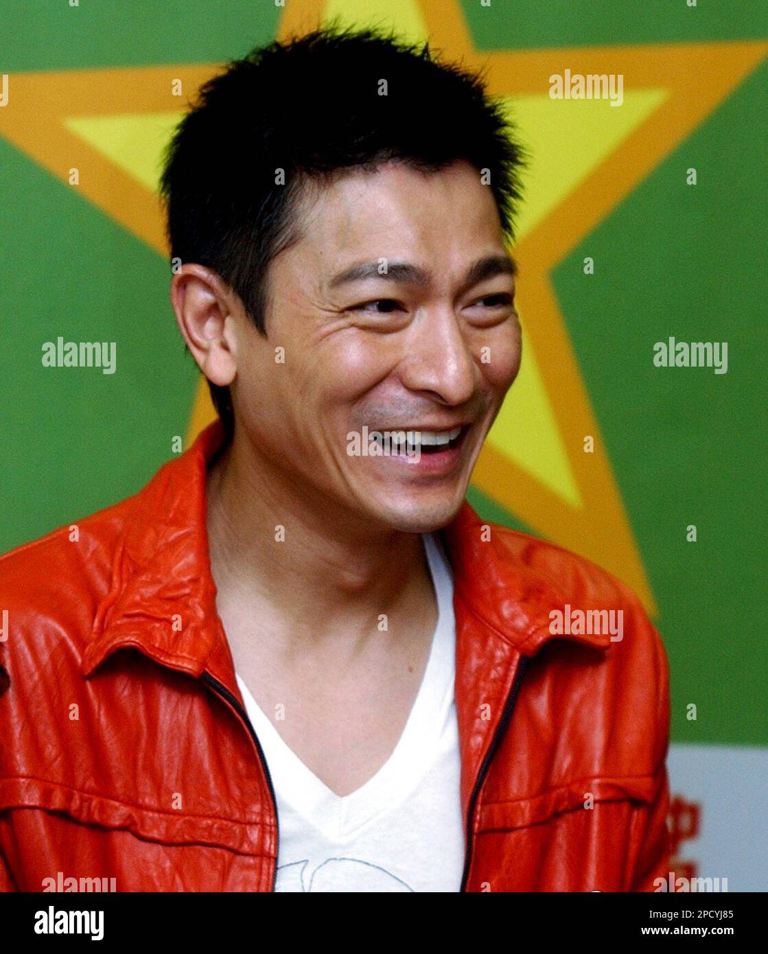 Hong Kong movie star Andy Lau poses before a radio interview in Hong ...