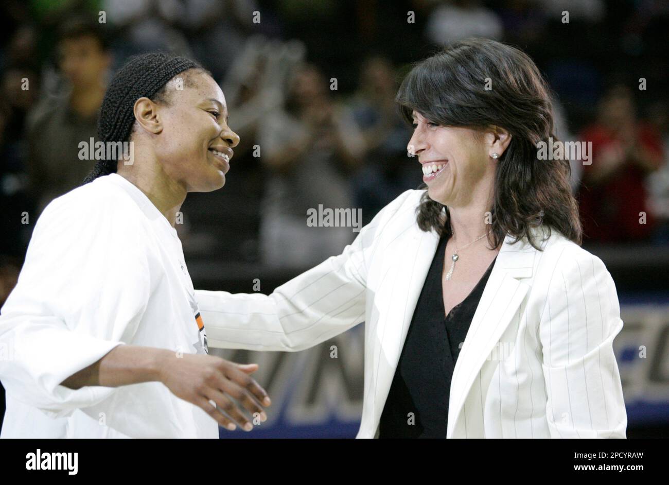 San Antonio Silver Stars' Vickie Johnson, left, embraces WNBA president ...