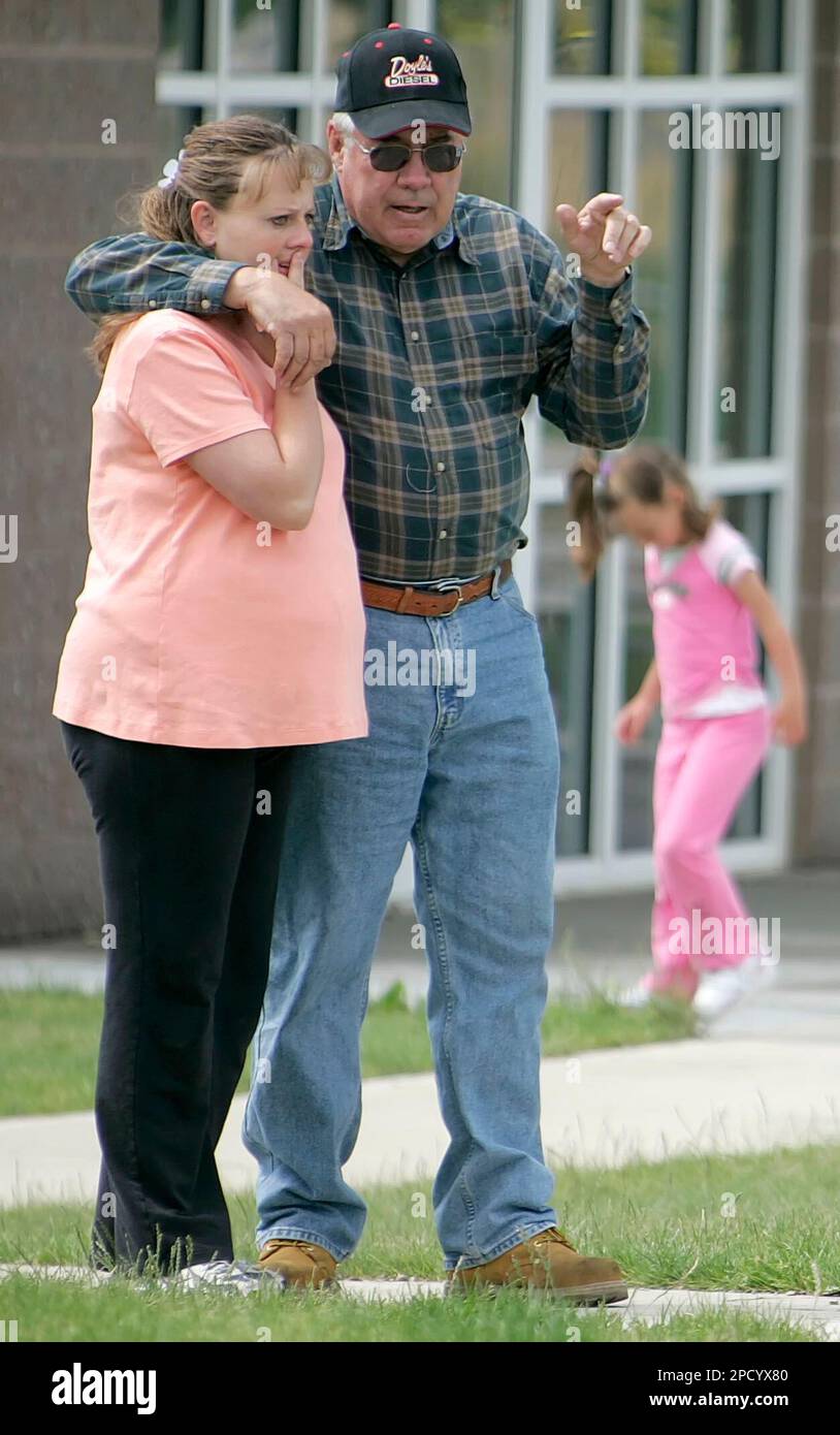 Chad Pugmire, right, and Teresa Pugmire, father and sister-in-law of ...