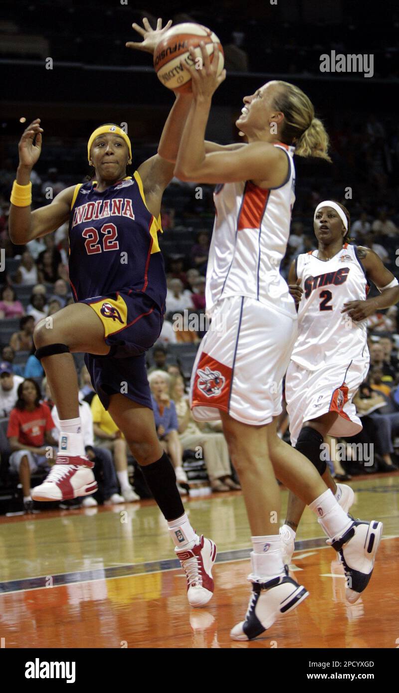 Charlotte Sting's Kelly Mazzante, right, has her shot blocked by ...