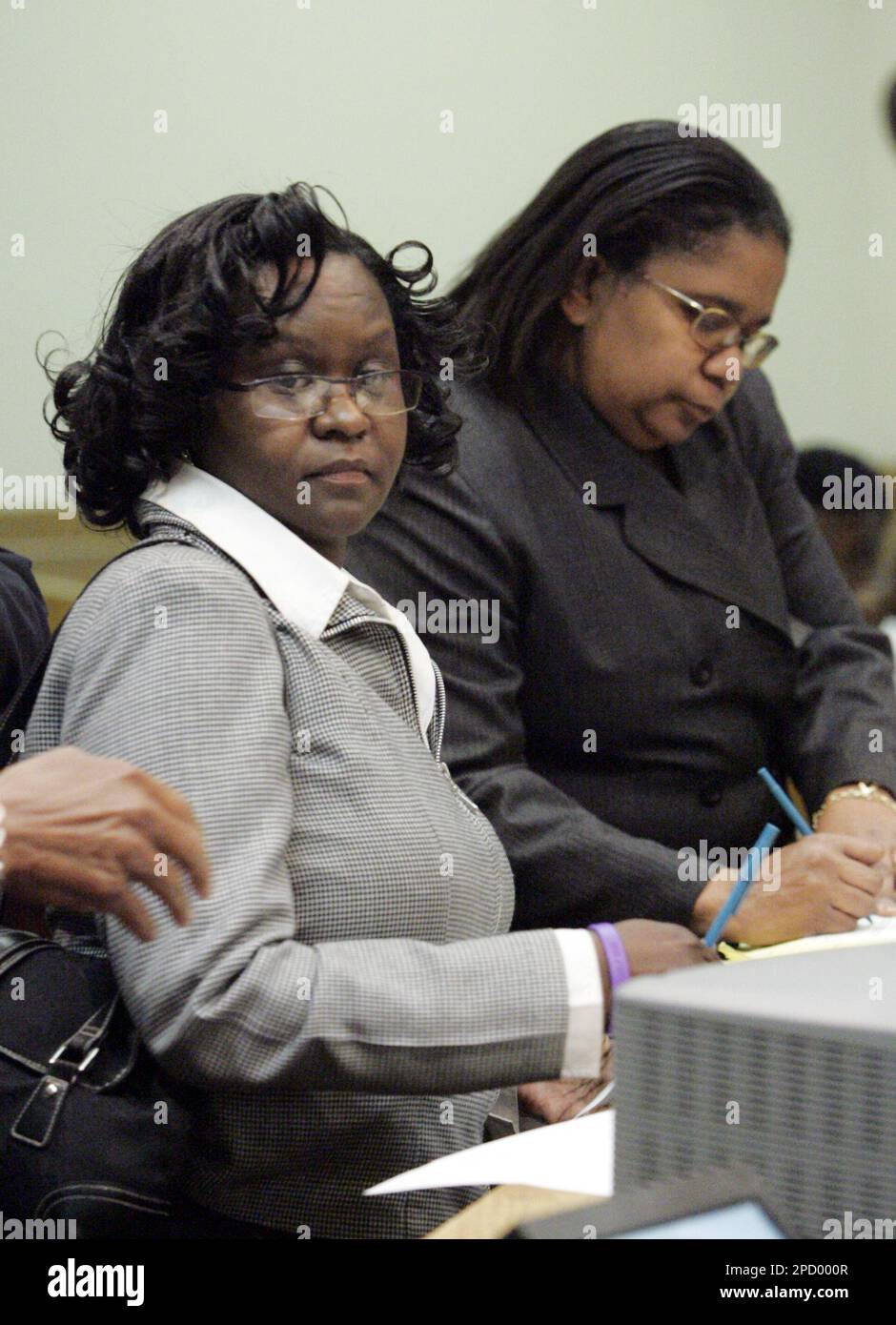 Sharon Nichols and Terri Sutton sign papers in 36th District Court in ...