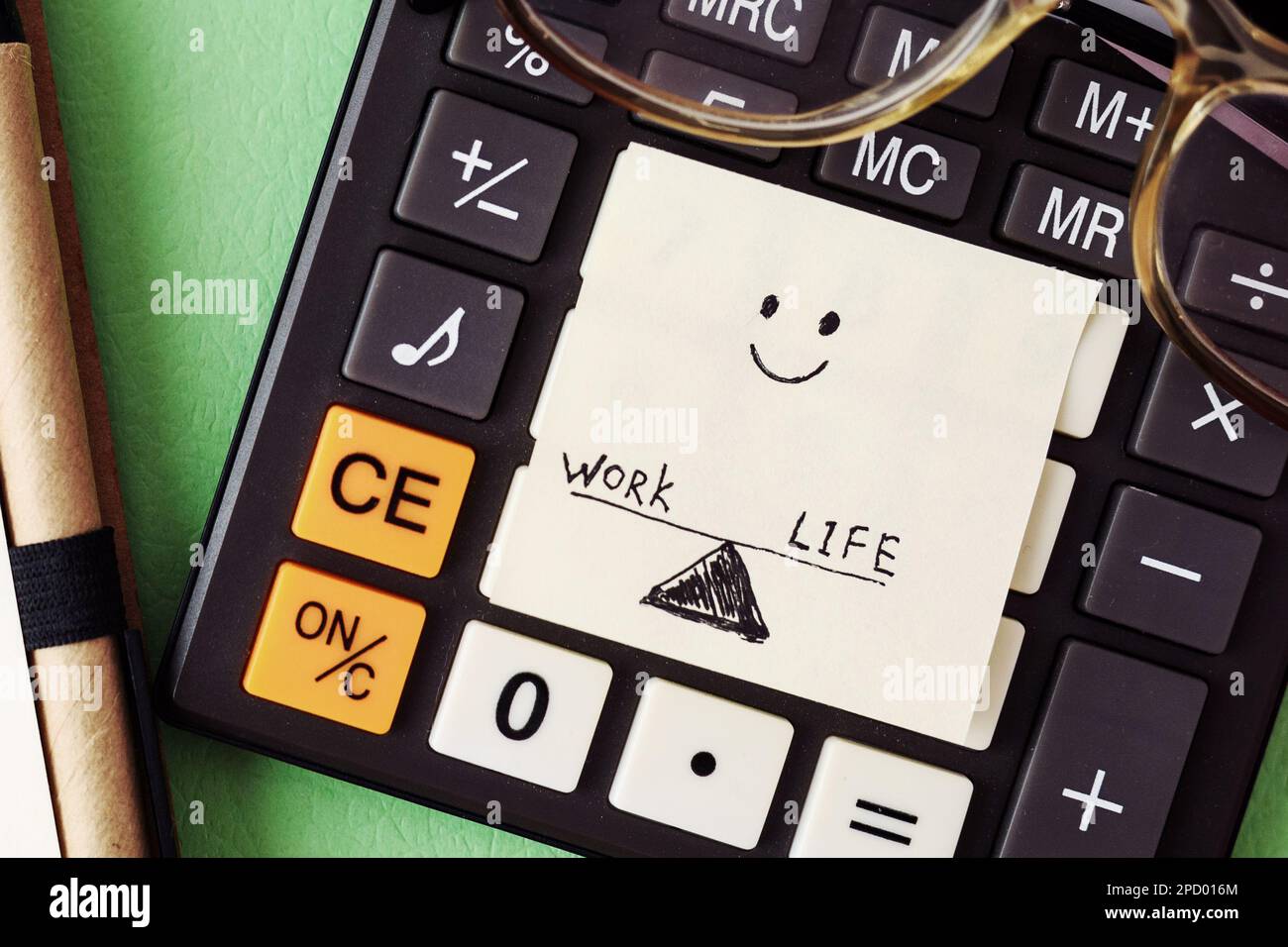 Work Life Balance - Finished work day concept: pen, glasses, calculator ...