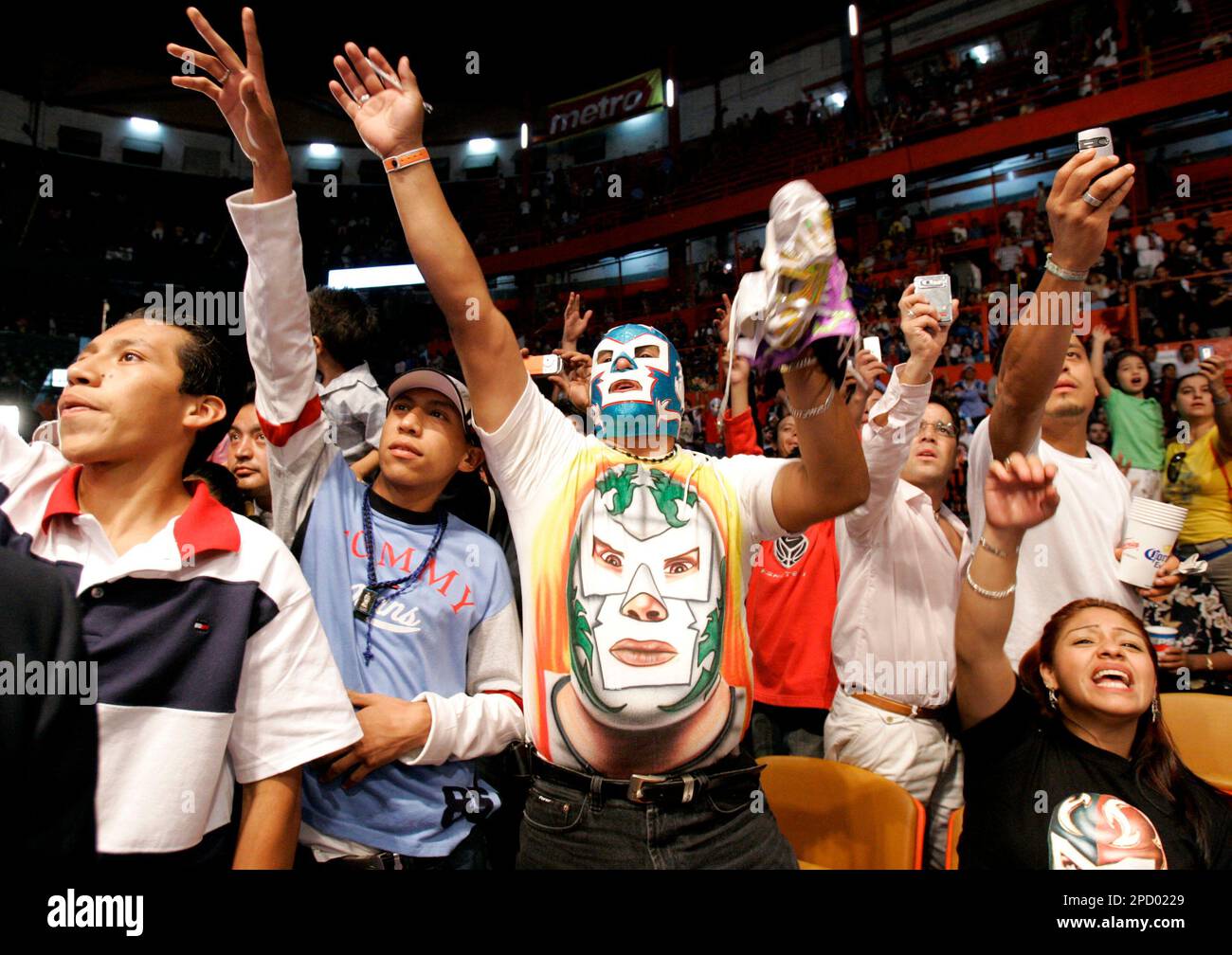 Lucha Libre fans of the well-known wrestler Doctor Wagner yell during a ...