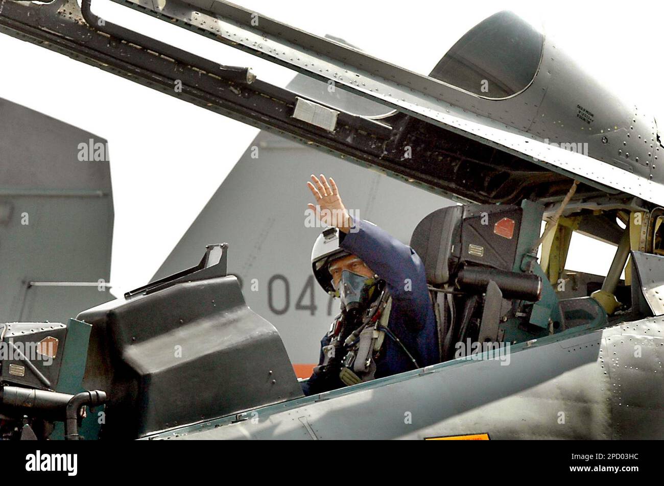 Indian President A.P.J. Abdul Kalam waves before his flight in a Sukhoi ...