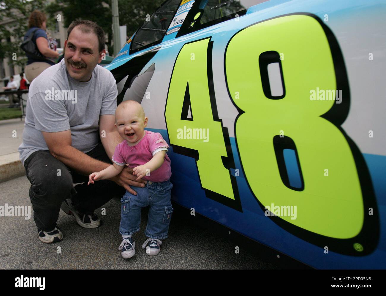 Eight-month-old Alexis Balliet and her father, Chris Balliet, pose for ...