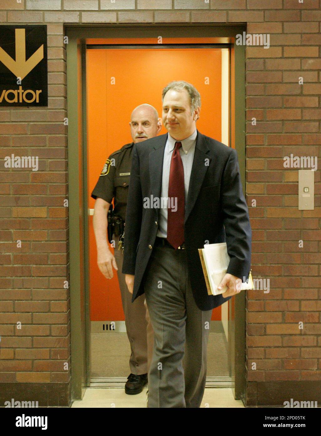 Mark Unger arrives at Benzie County courtroom for his murder trial ...