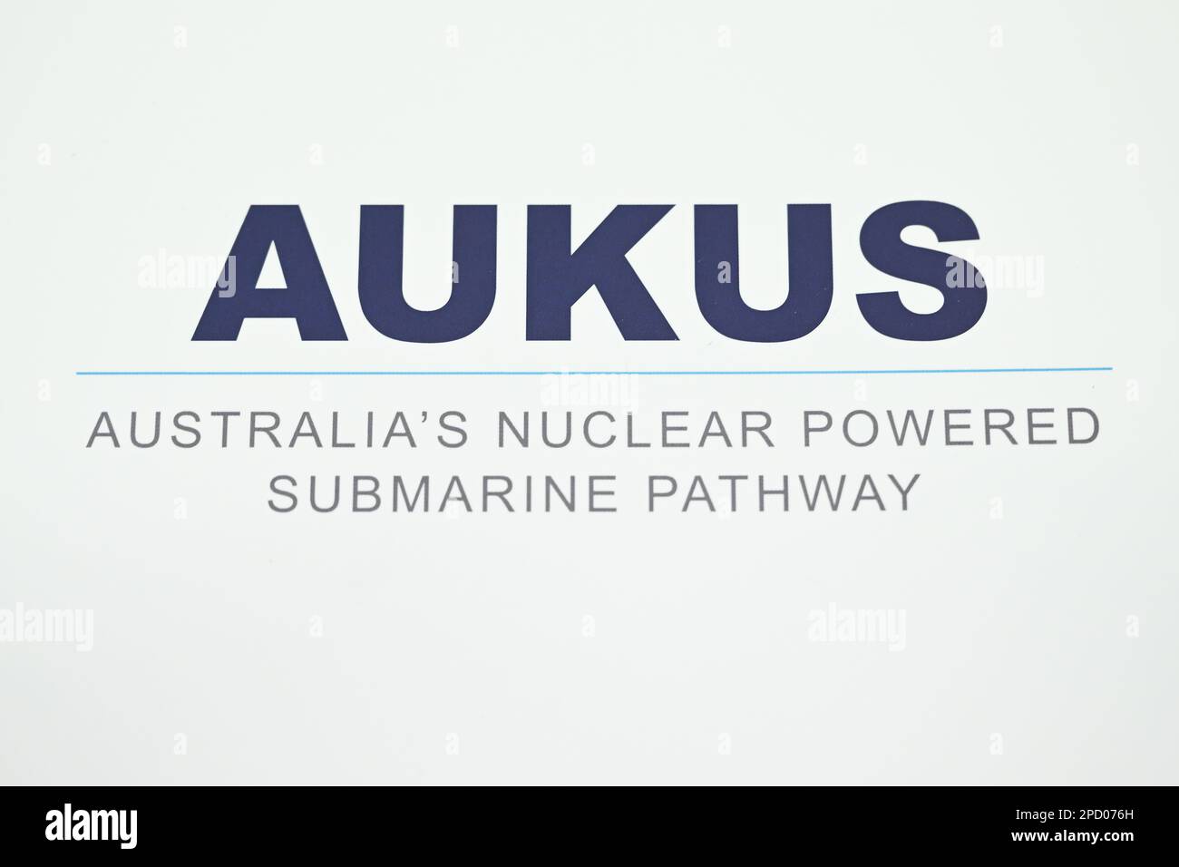 An AUKUS logo is seen on a press brochure at Parliament House in ...