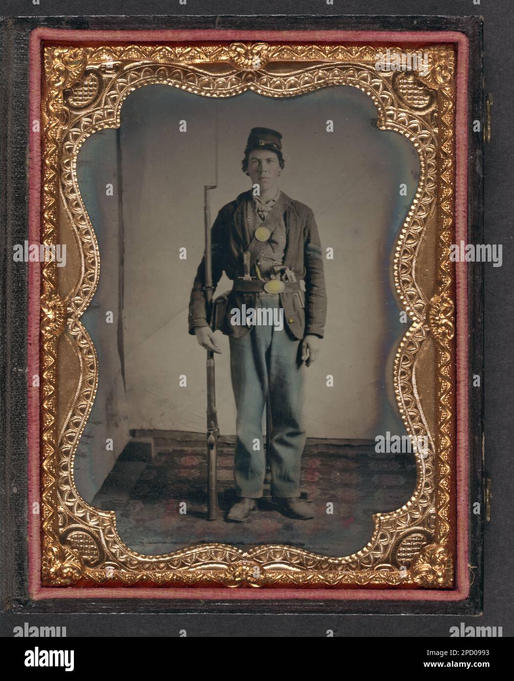 Private Hiram M. Kersey, 44th Iowa Infantry regiment, standing on rug ...