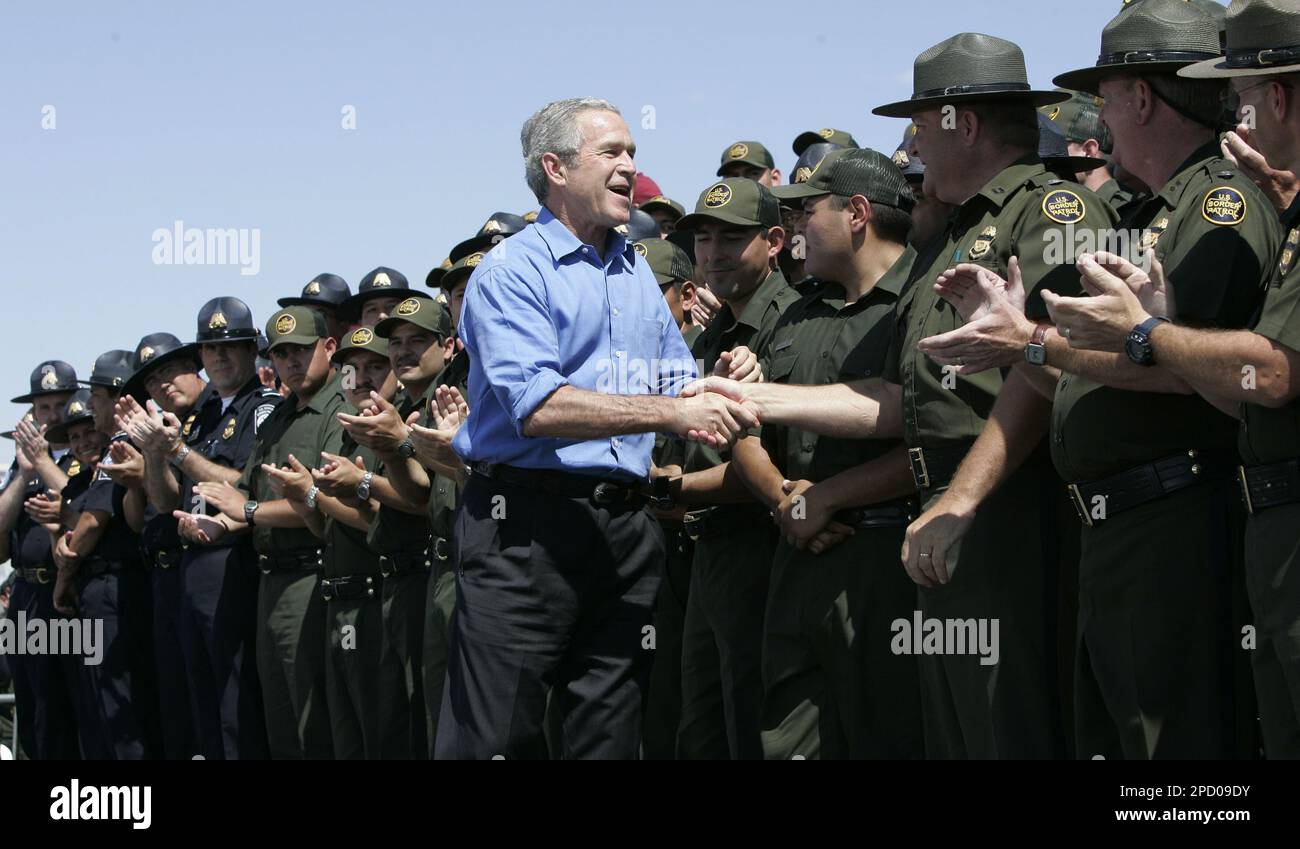 President Bush greets U.S. Border Patrol officers before speaking about ...