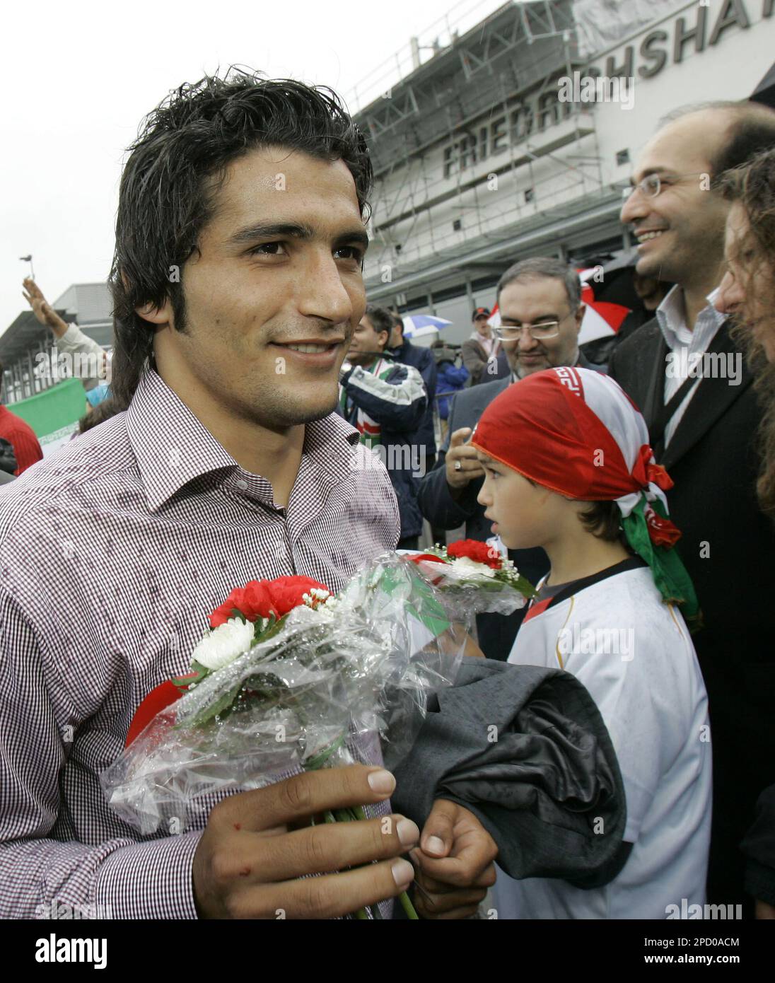 ** FILE ** Mehdi Mahdavikia, left, of Iran's national soccer team ...