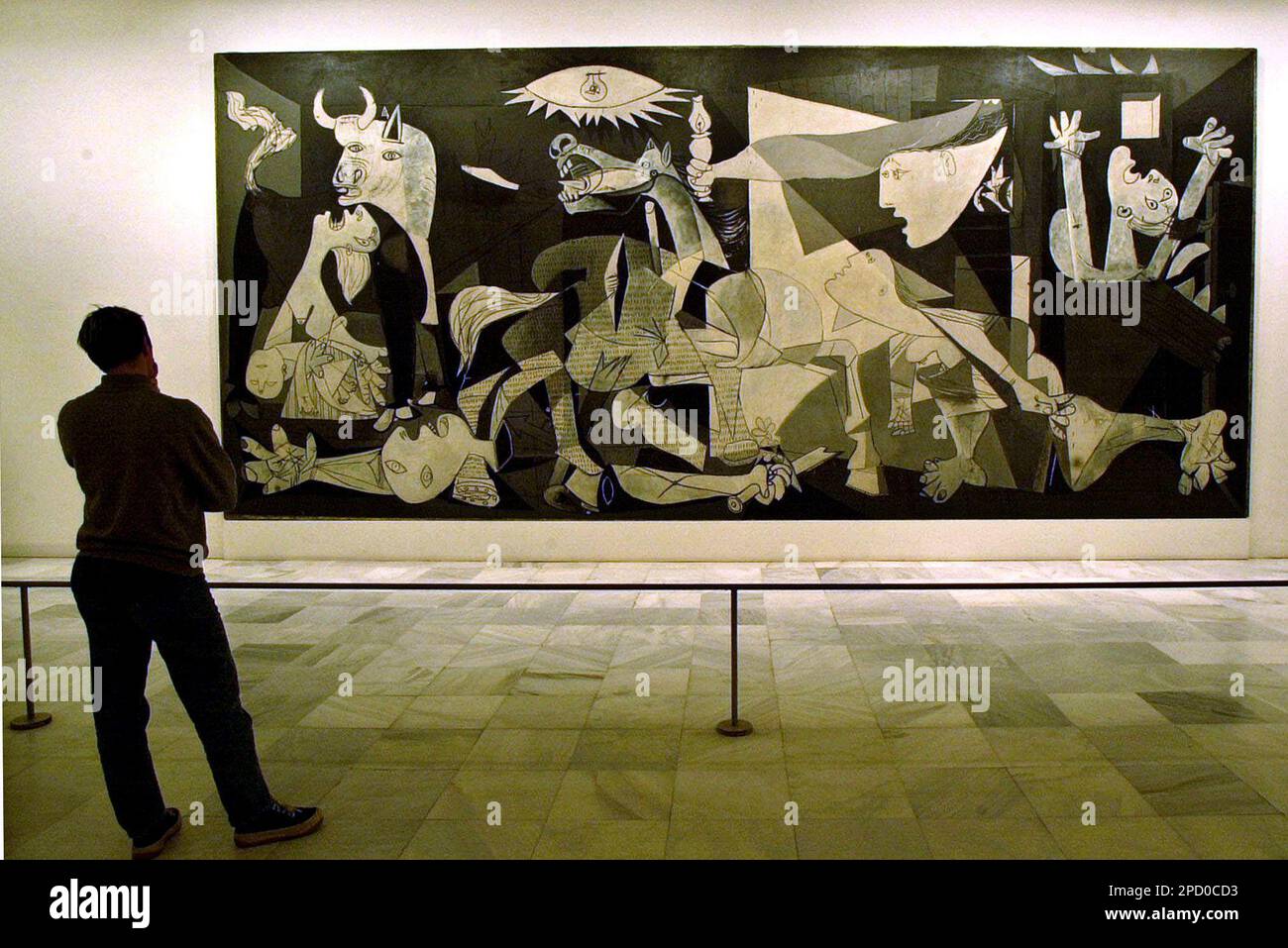 ** FILE ** A person views Spanish artist Pablo Picasso's world famous ...