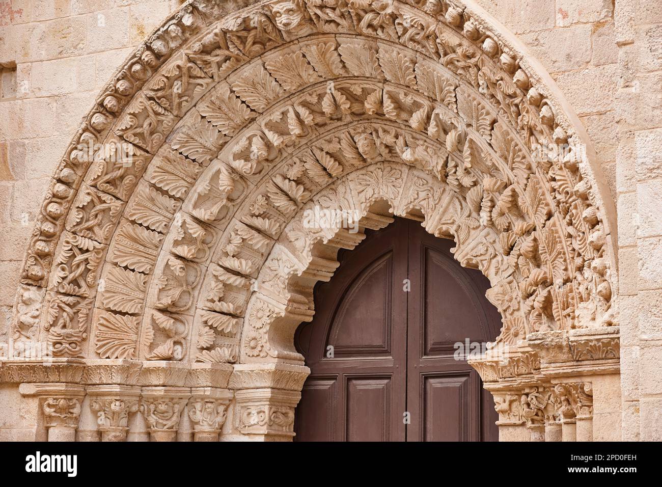 Romanesque decorated arch in Zamora cathedral, San Juan. Spanish art ...