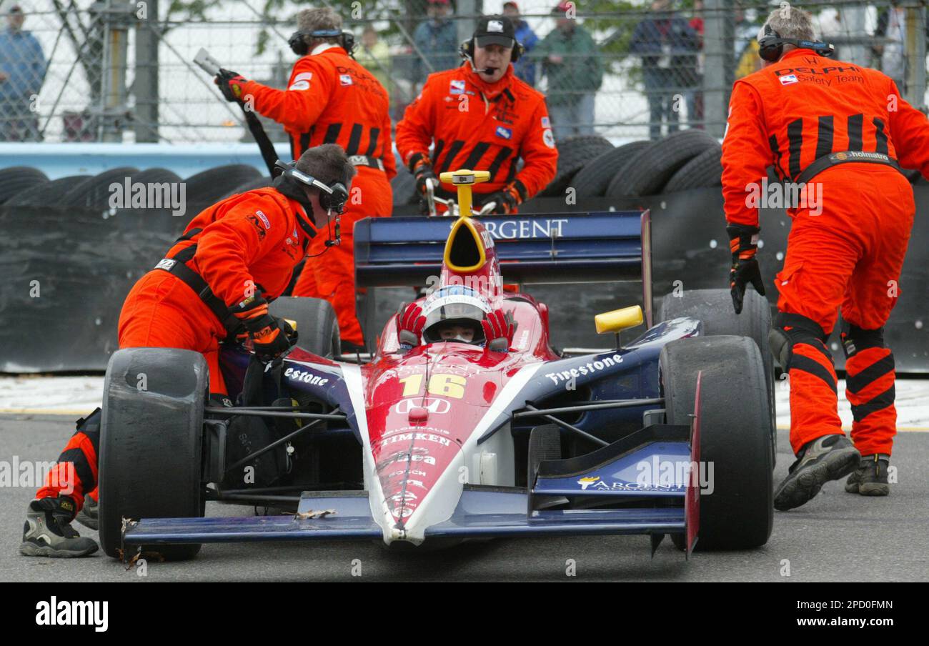 Danica Patrick reacts after she hit the tire barrier in turn 11 as ...
