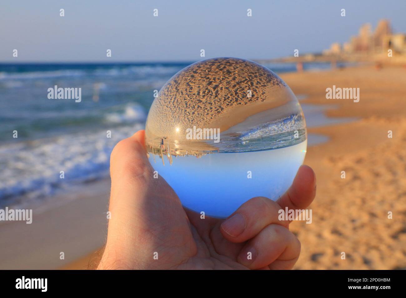 Beach vibes in Haifa, Israel. Glass sphere reflection of Dado Beach in ...