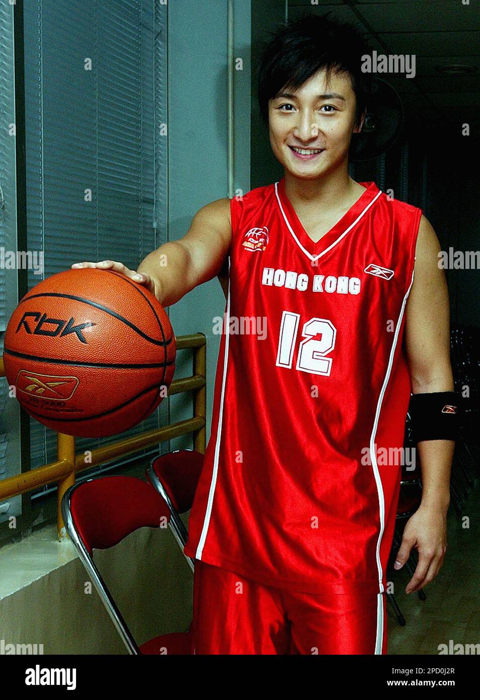 Hong Kong pop singer and athlete Alex Fong poses for pictures as he ...