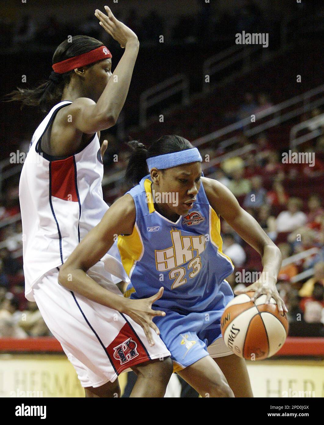 Chicago Sky's Deanna Jackson, right, drives to the basket as Houston ...