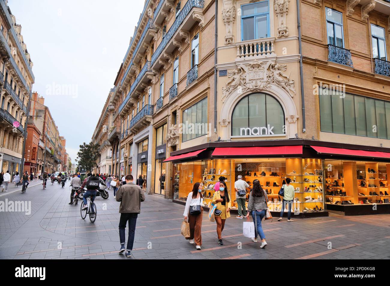 TOULOUSE, FRANCE - SEPTEMBER 28, 2021: People visit shopping street in ...