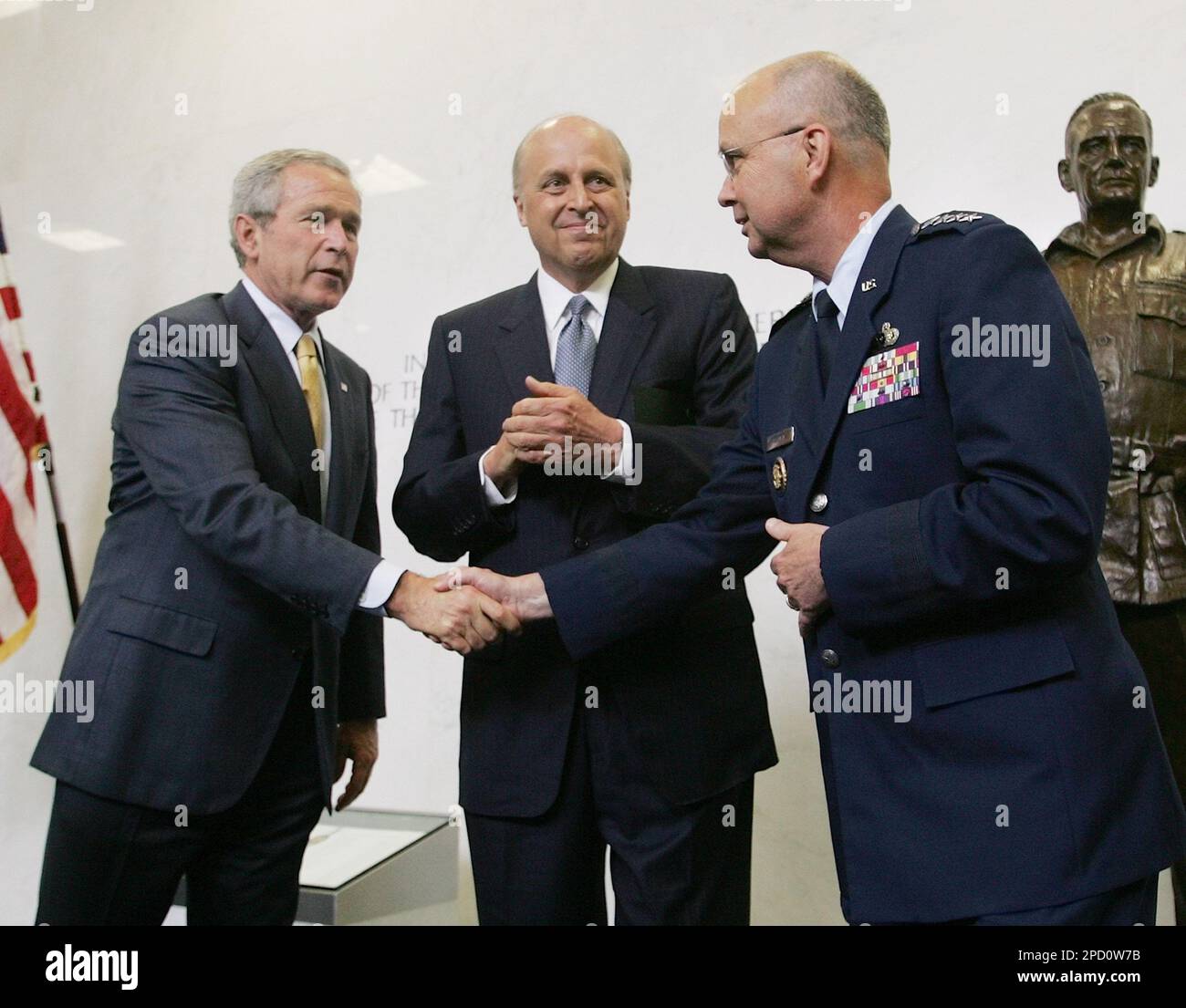 President Bush shakes hands with Gen. Michael Hayden as Director of ...