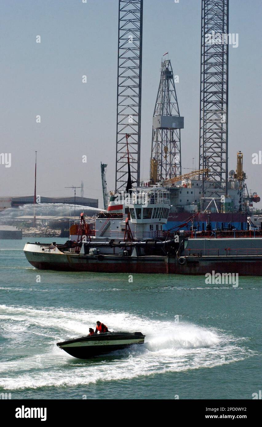 ** FILE ** Iranian police officers patrol part of the Caspian sea in ...