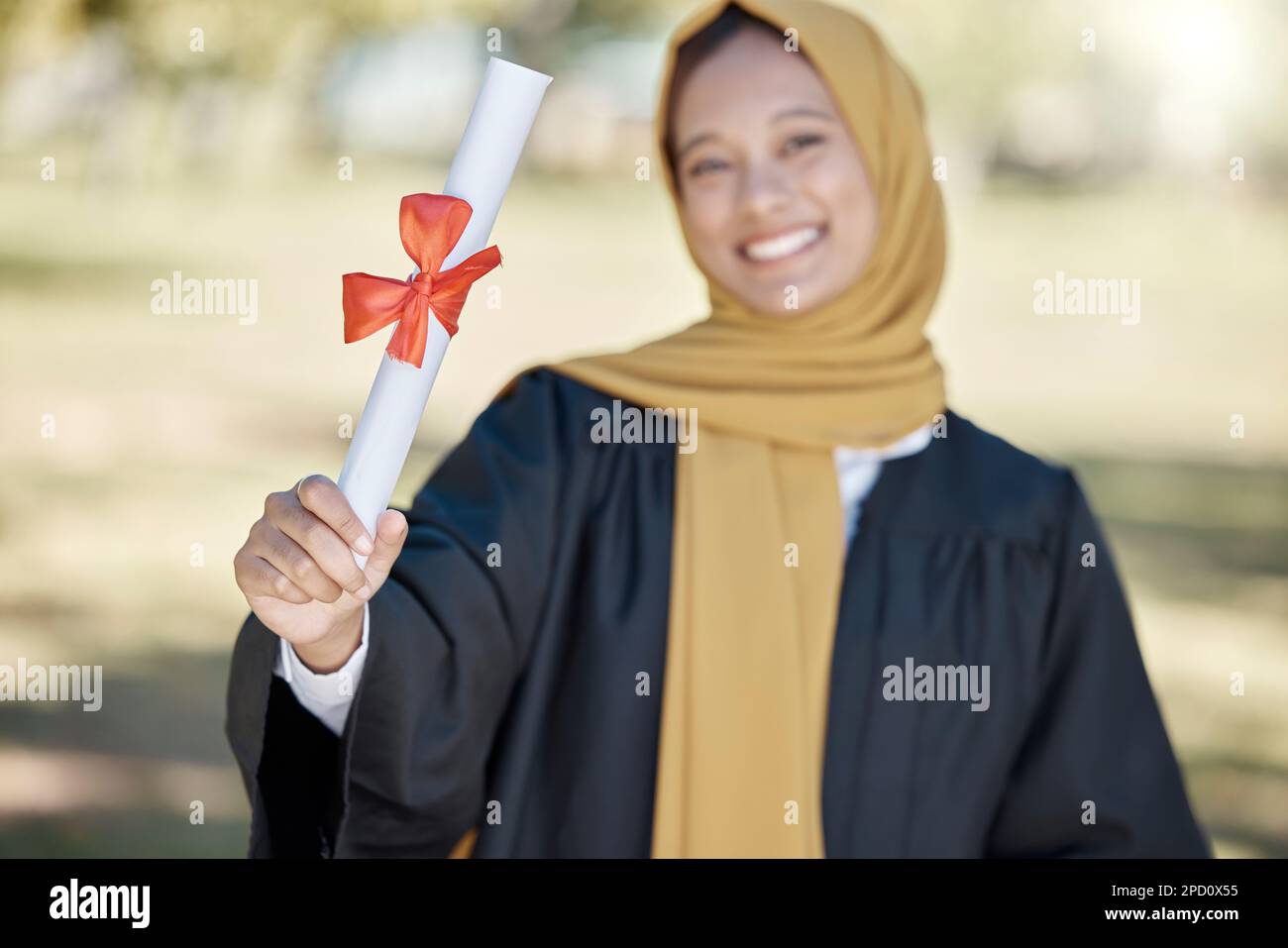 Graduation, university diploma and Muslim woman with award for success ...