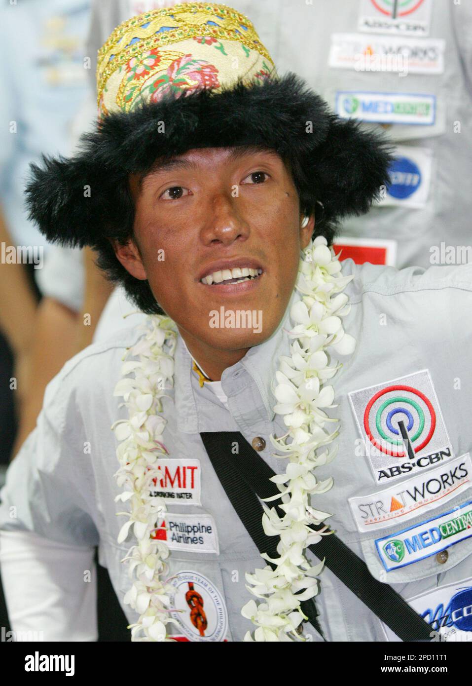 Filipino mountaineer Leo Oracion prepares to answer questions during a ...