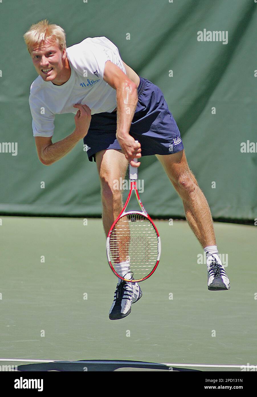 UCLA's Benjamin Kohlloeffel serves against Virginia's Somdev Devvarman ...