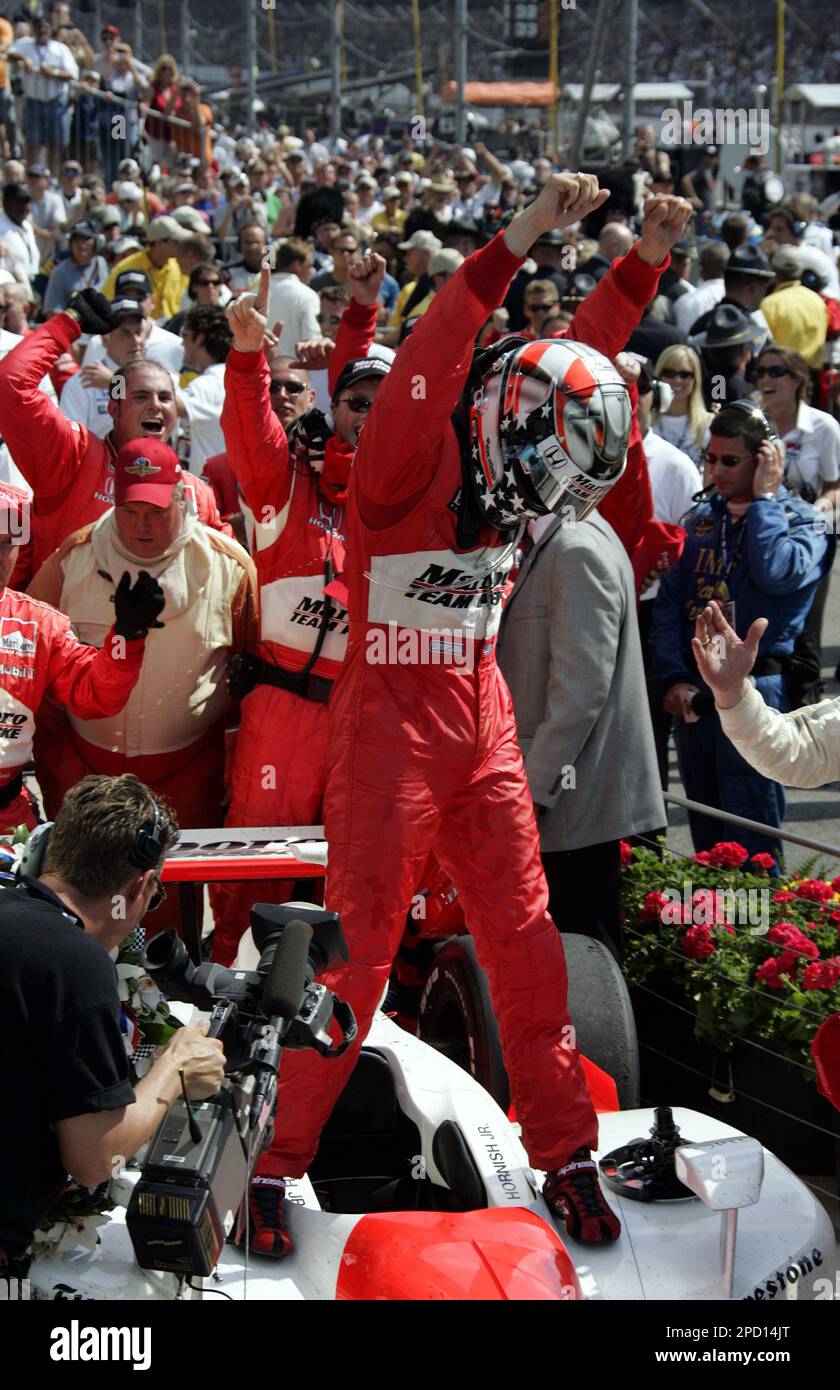 Indy Racing League driver Sam Hornish Jr. celebrates on top of his car ...