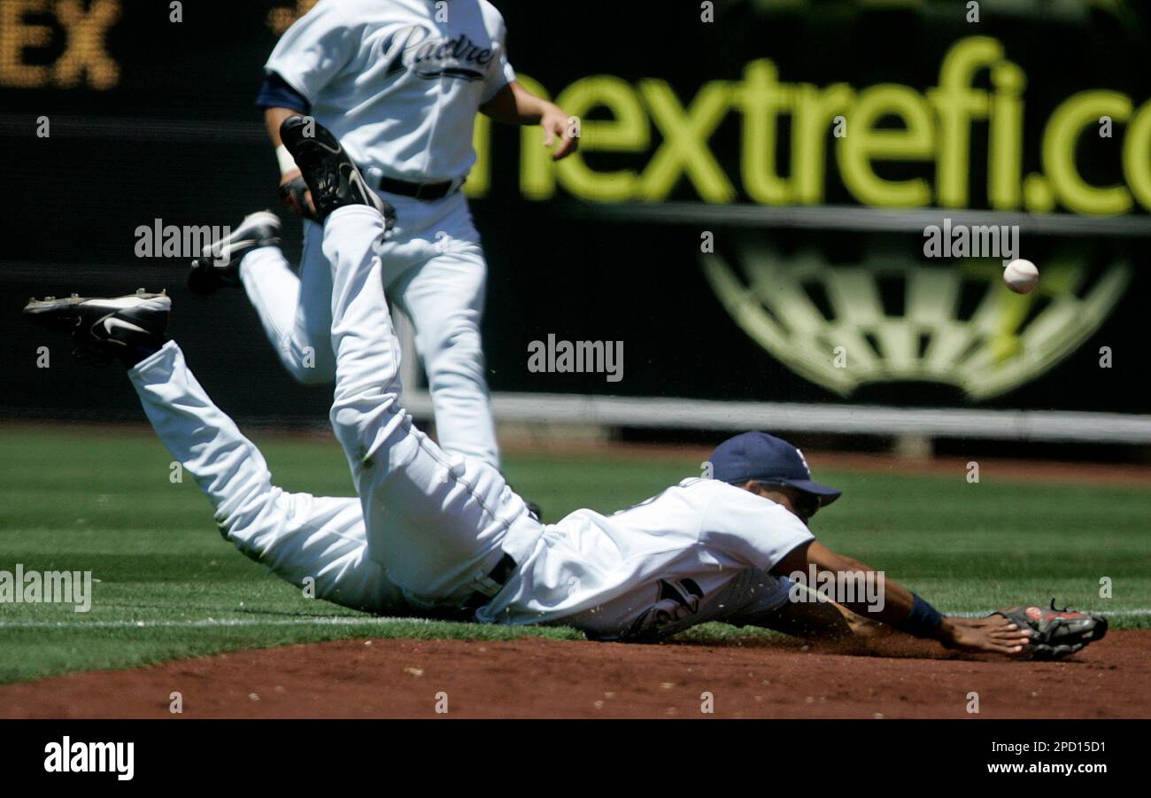 San Diego Padres second baseman Josh Barfield can't quite catch a bloop ...