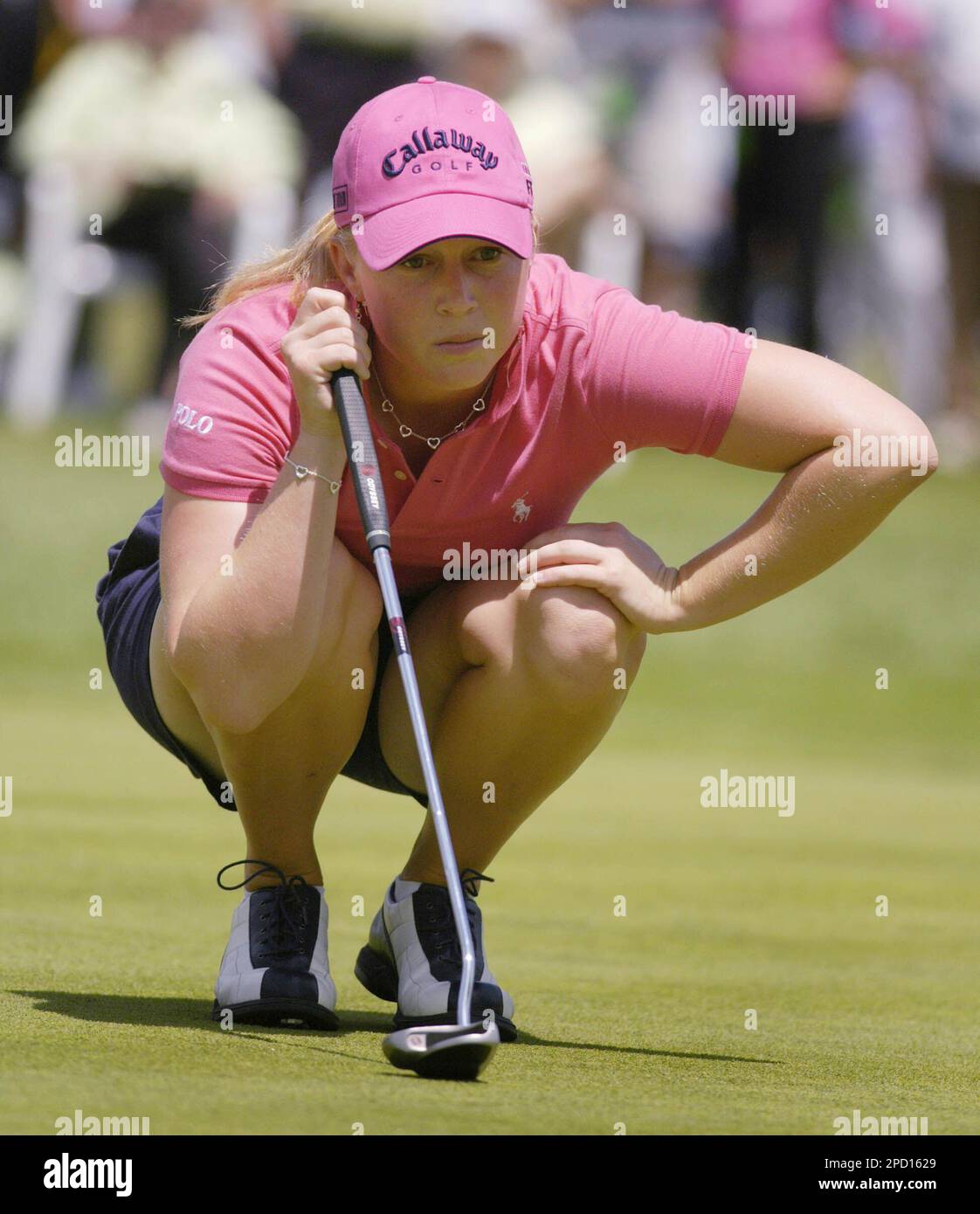 Morgan Pressel lines up her putt on the fifth hole during the final ...