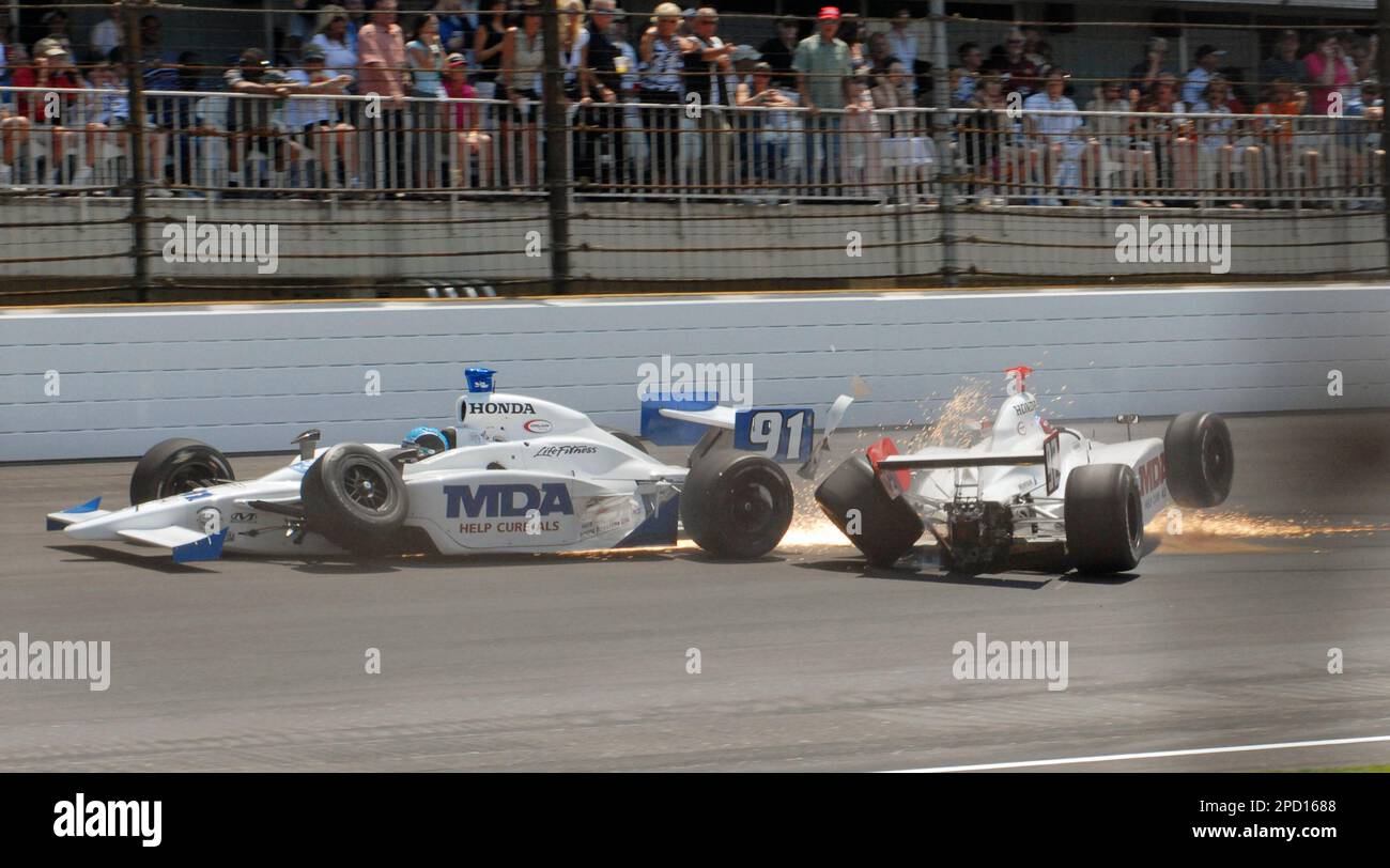 The cars of P.J. Chesson, left, and Jeff Bucknum show damage after ...