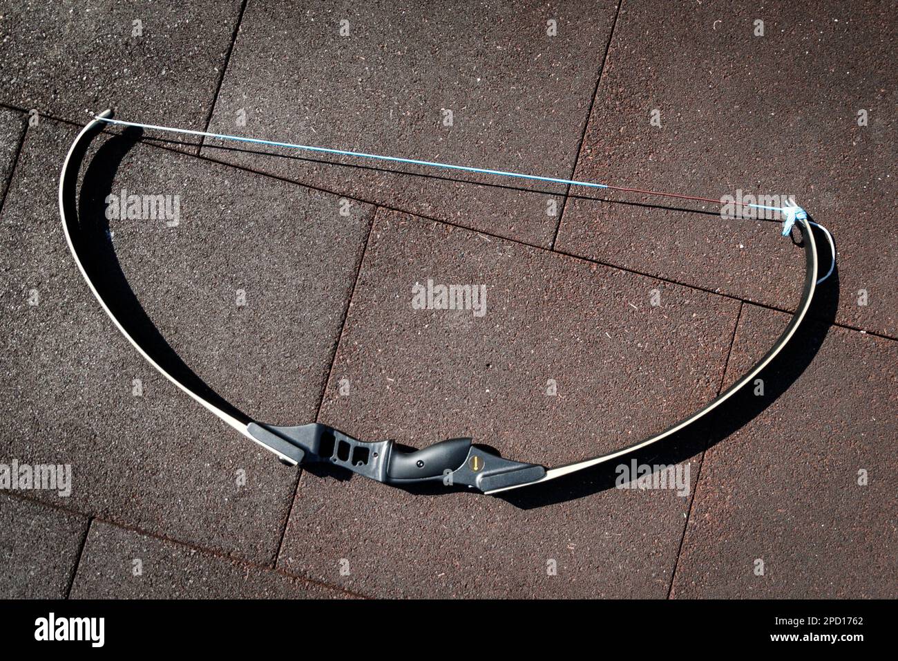 Modern sports bow lies on the sports ground at team building sports ...