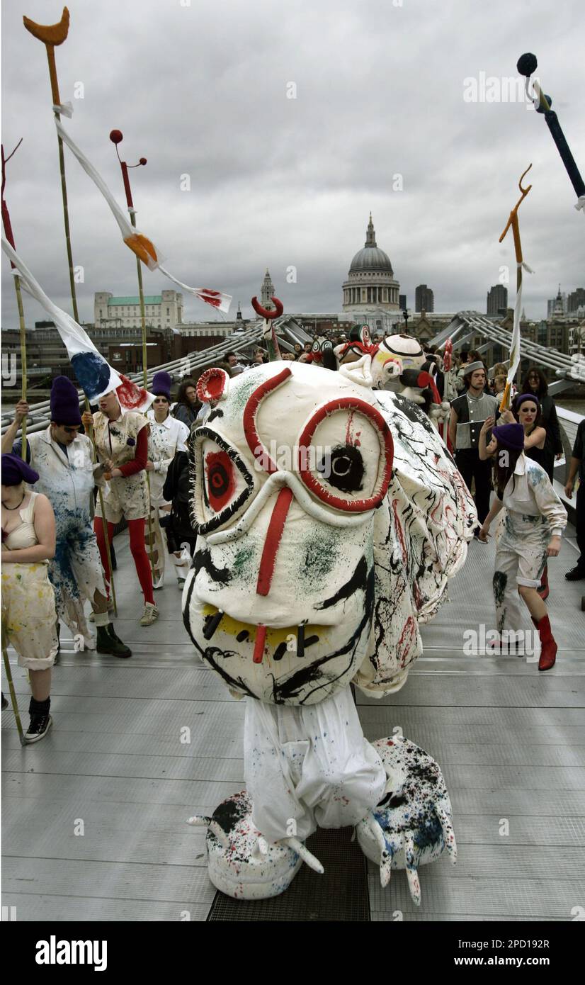 Backdropped by the St. Paul's cathedral, giant puppets designed by late ...