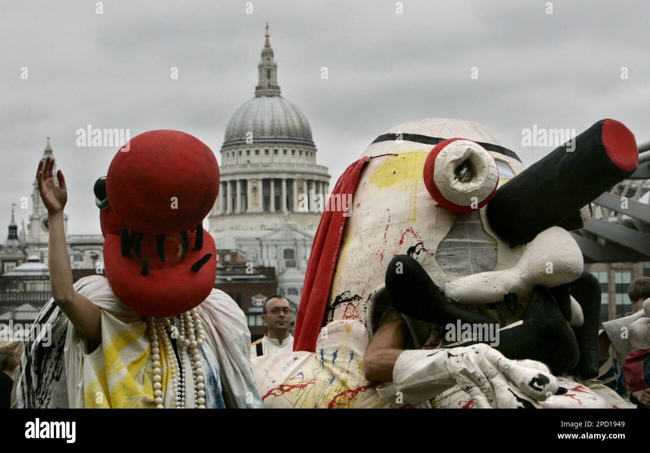Backdropped by the St. Paul's cathedral, giant puppets designed by late ...