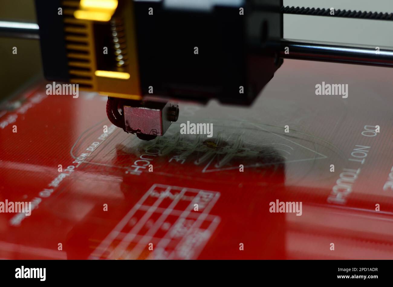 3D printer prints red form Stock Photo - Alamy